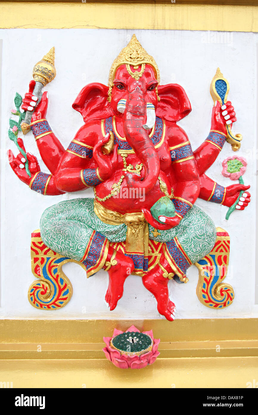Red Statue Ganesh in the temple on the wall Stock Photo - Alamy