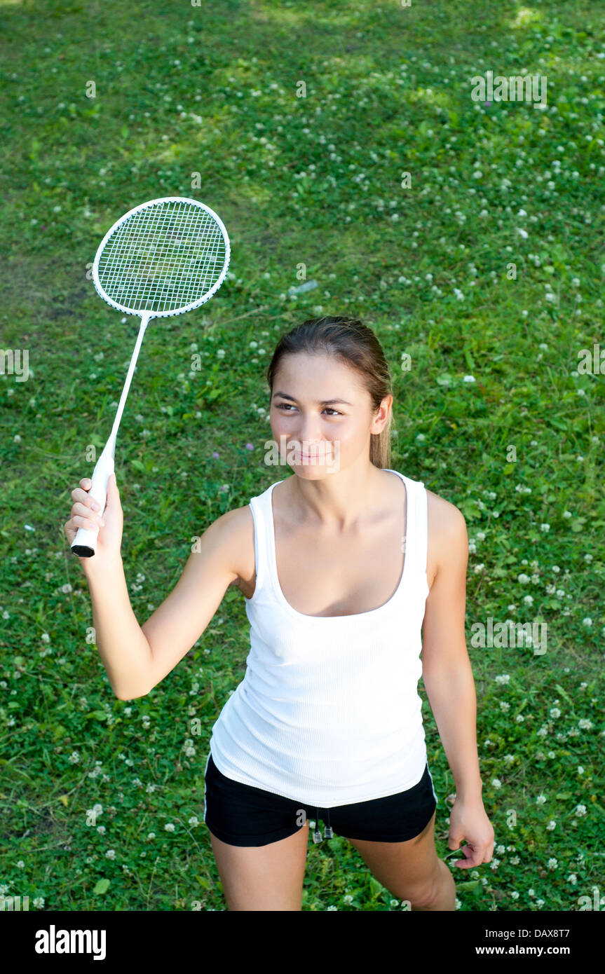 Beautiful Young Woman Playing Badminton Stock Photo - Alamy