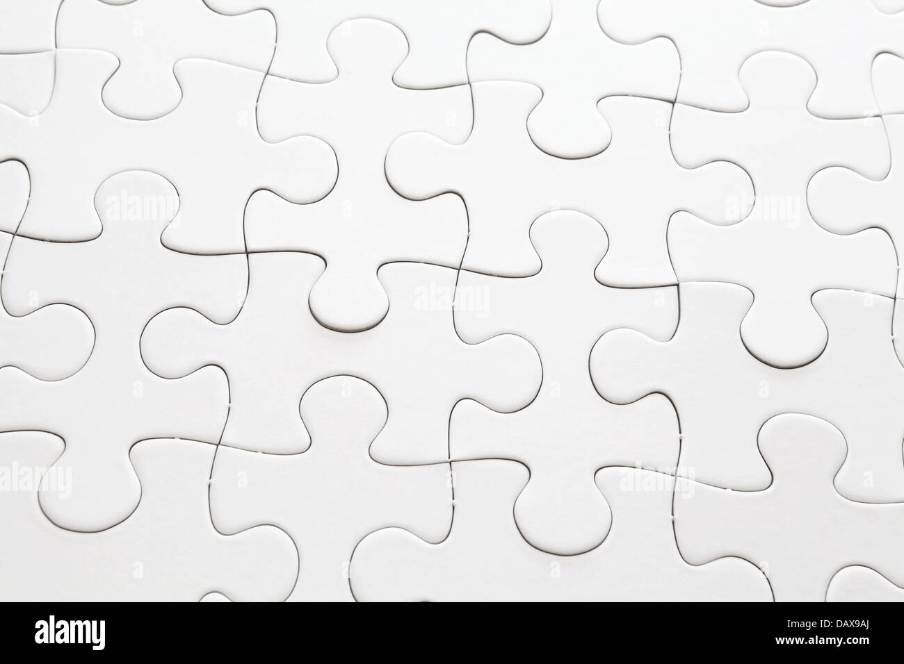 white jigsaw puzzle Stock Photo - Alamy