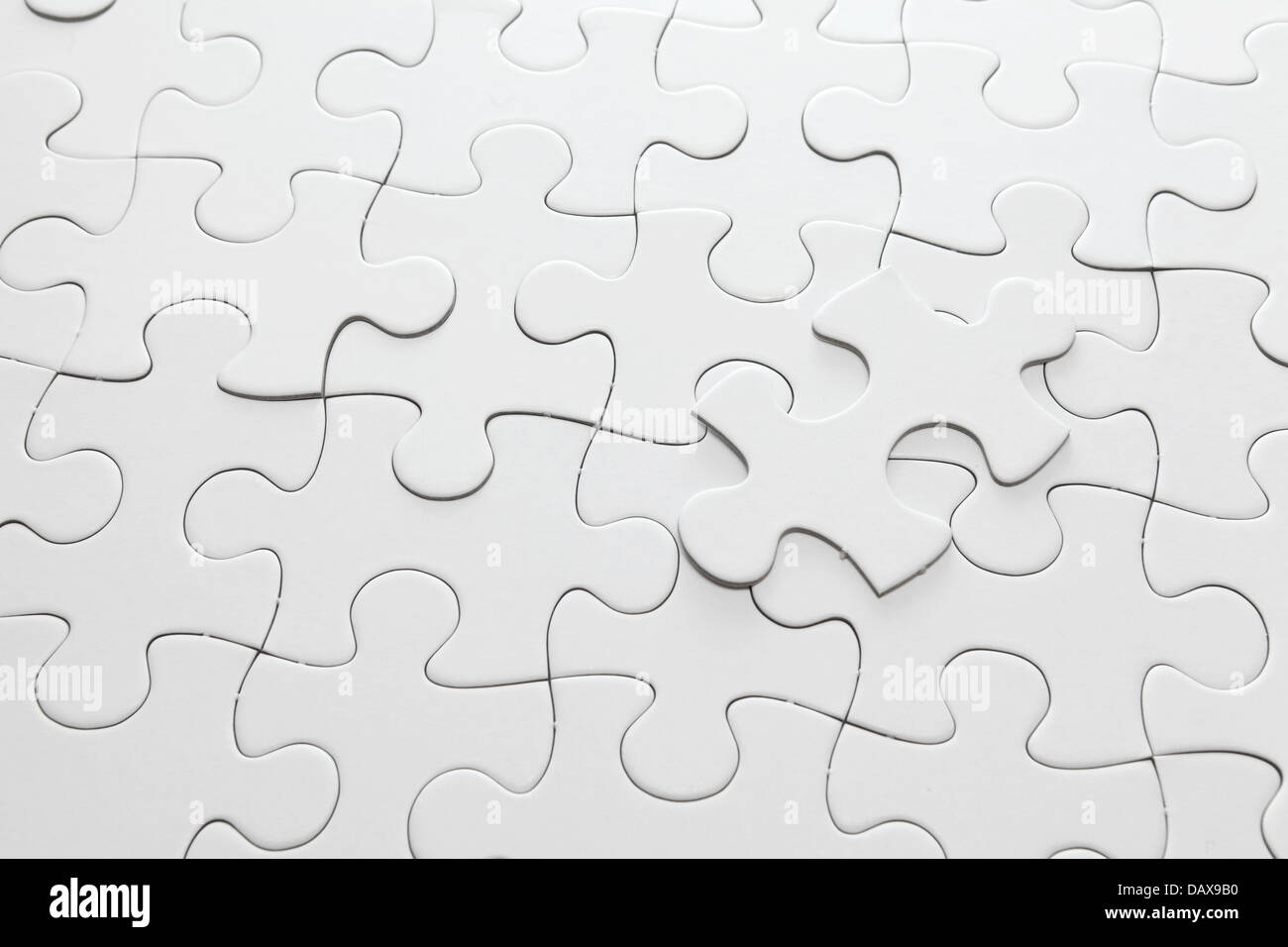 white jigsaw puzzle Stock Photo - Alamy