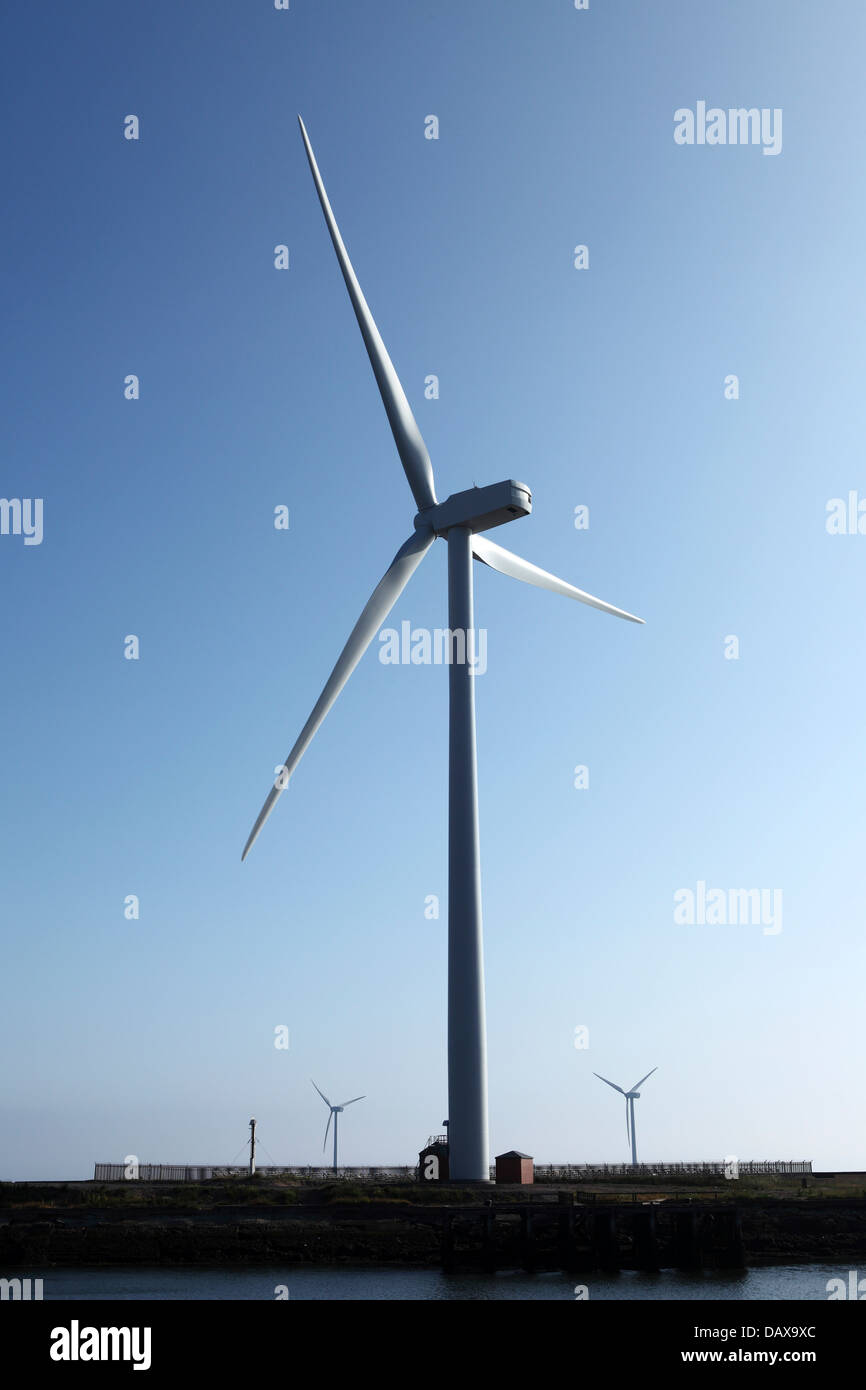 Wind turbines at Blyth Harbour Wind Farm in Northumberland, England ...