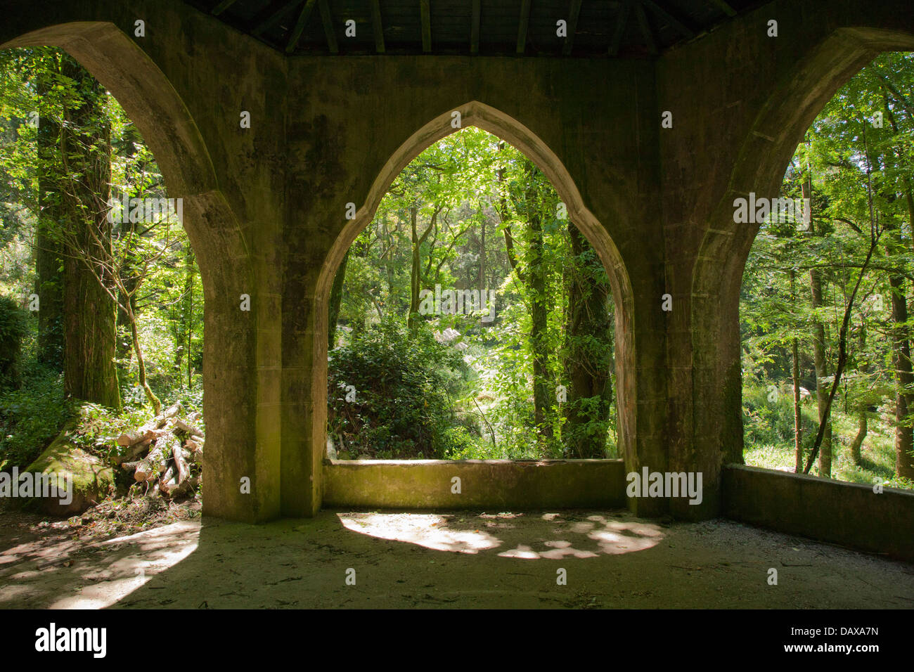 Sintra Gardens, Pena, Gothic arches of this folly frame the woodland ...