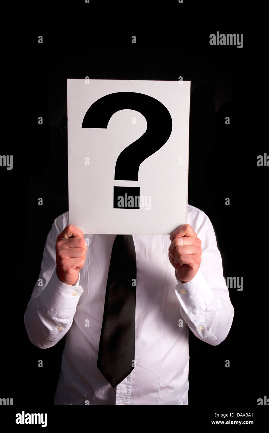 Businesspeople holding question mark hi-res stock photography and ...