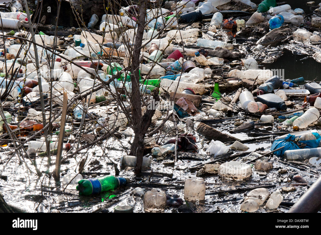 Water pollution with large group of junk Stock Photo - Alamy