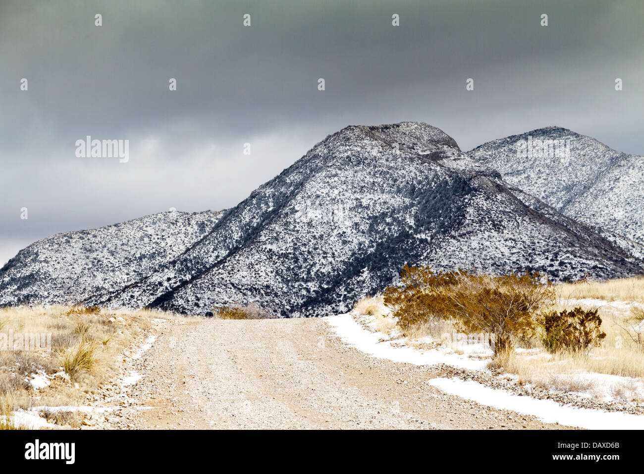 Snow touches rugged Dragoon Mountains, south of Tucson, AZ; metaphor of ...