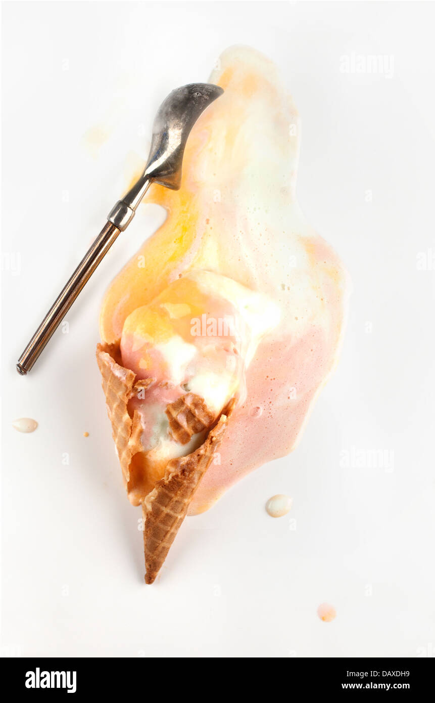 Vanilla ice cream melting cone hi-res stock photography and images - Alamy