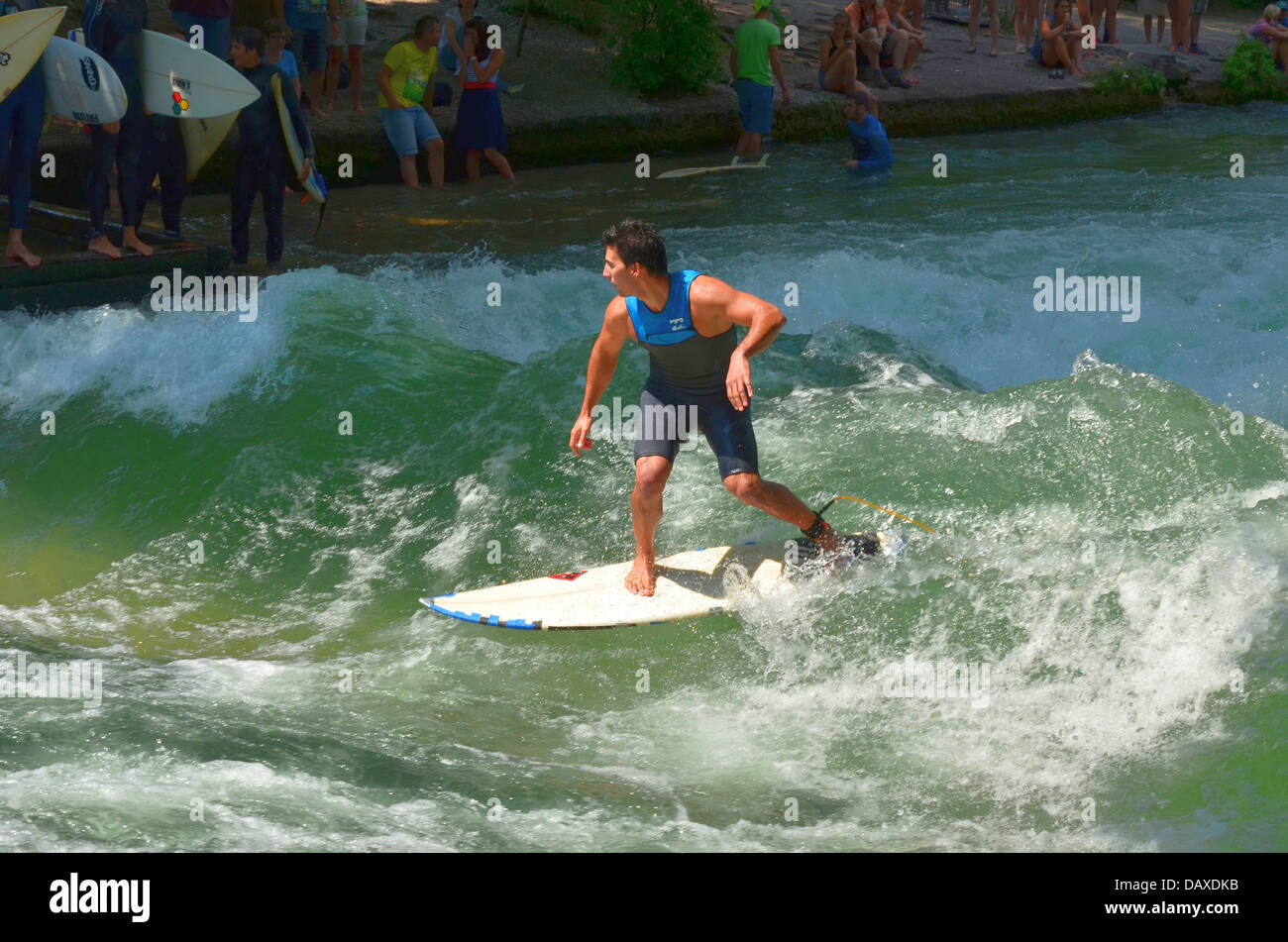 Surfing on the famous wave of the Eisbach in Munich Stock Photo - Alamy