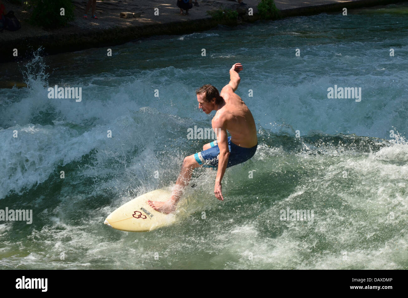 Surfing on the famous wave of the Eisbach in Munich Stock Photo - Alamy