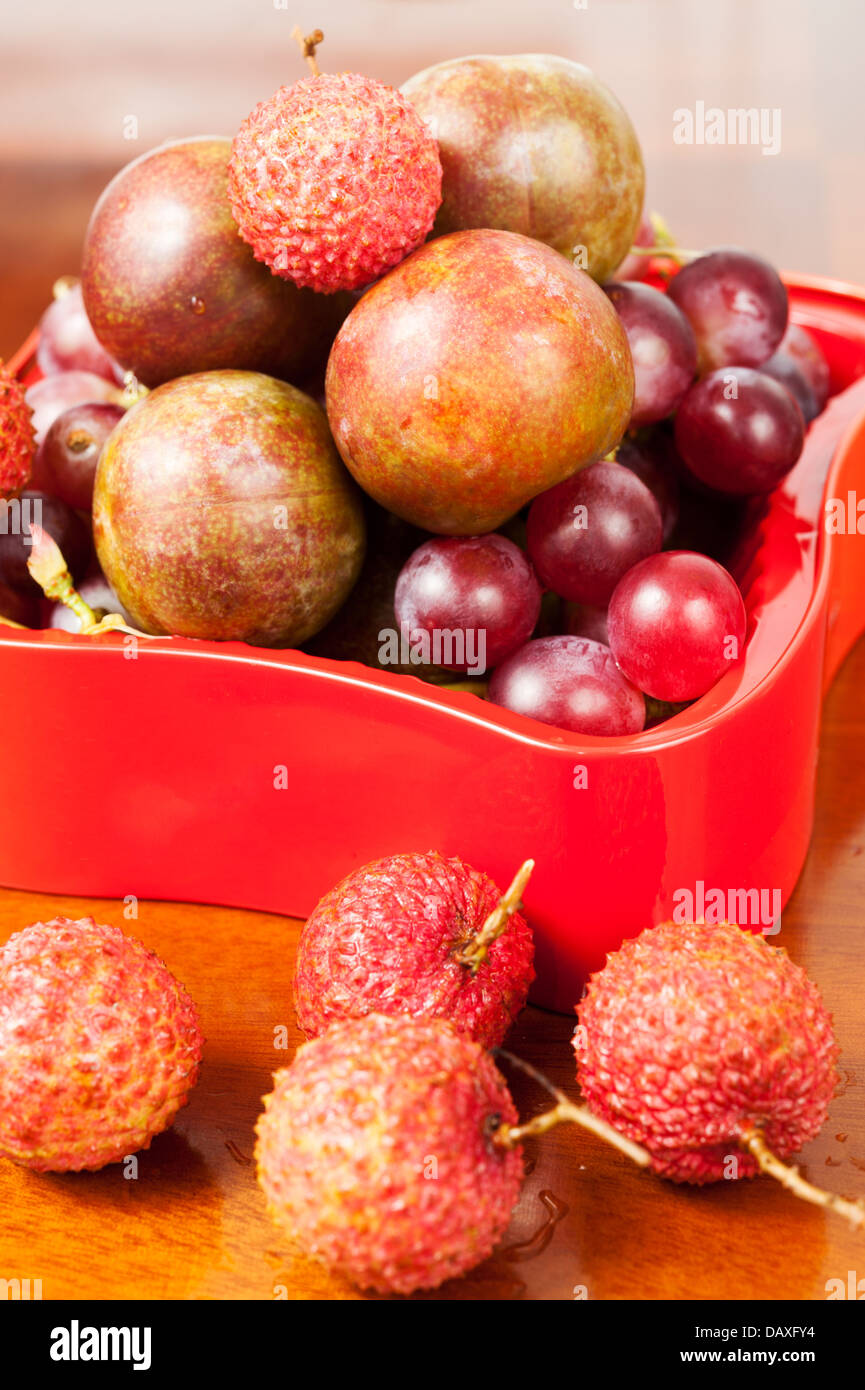 Group of fruits on the wooden table Stock Photo - Alamy