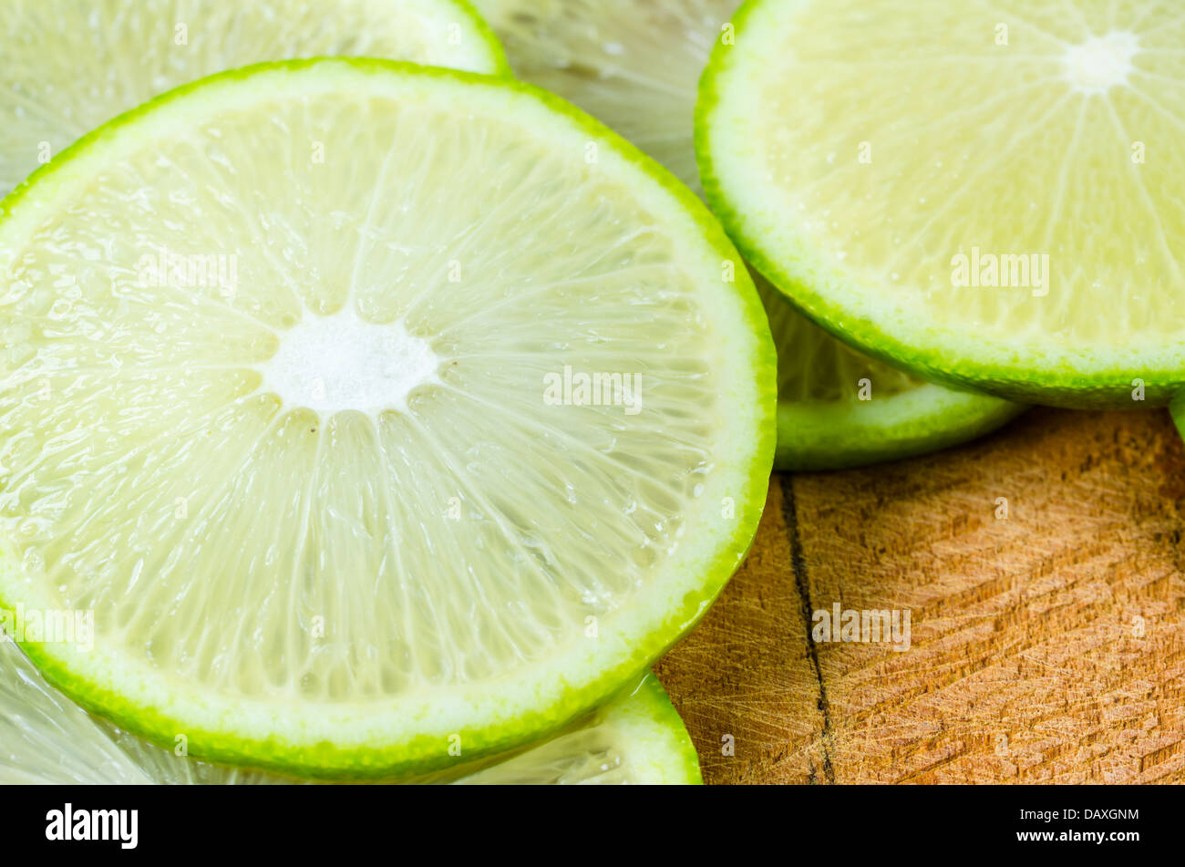 lemon slice in wood background in the raw fruit concept Stock Photo - Alamy