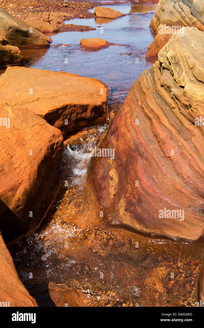 Spittal Beach Sandstone rock strata covered in iron ore. Spittal ...