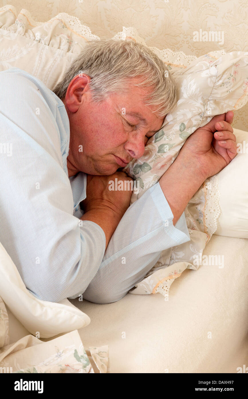 Vintage photo of an elderly man sleeping Stock Photo - Alamy