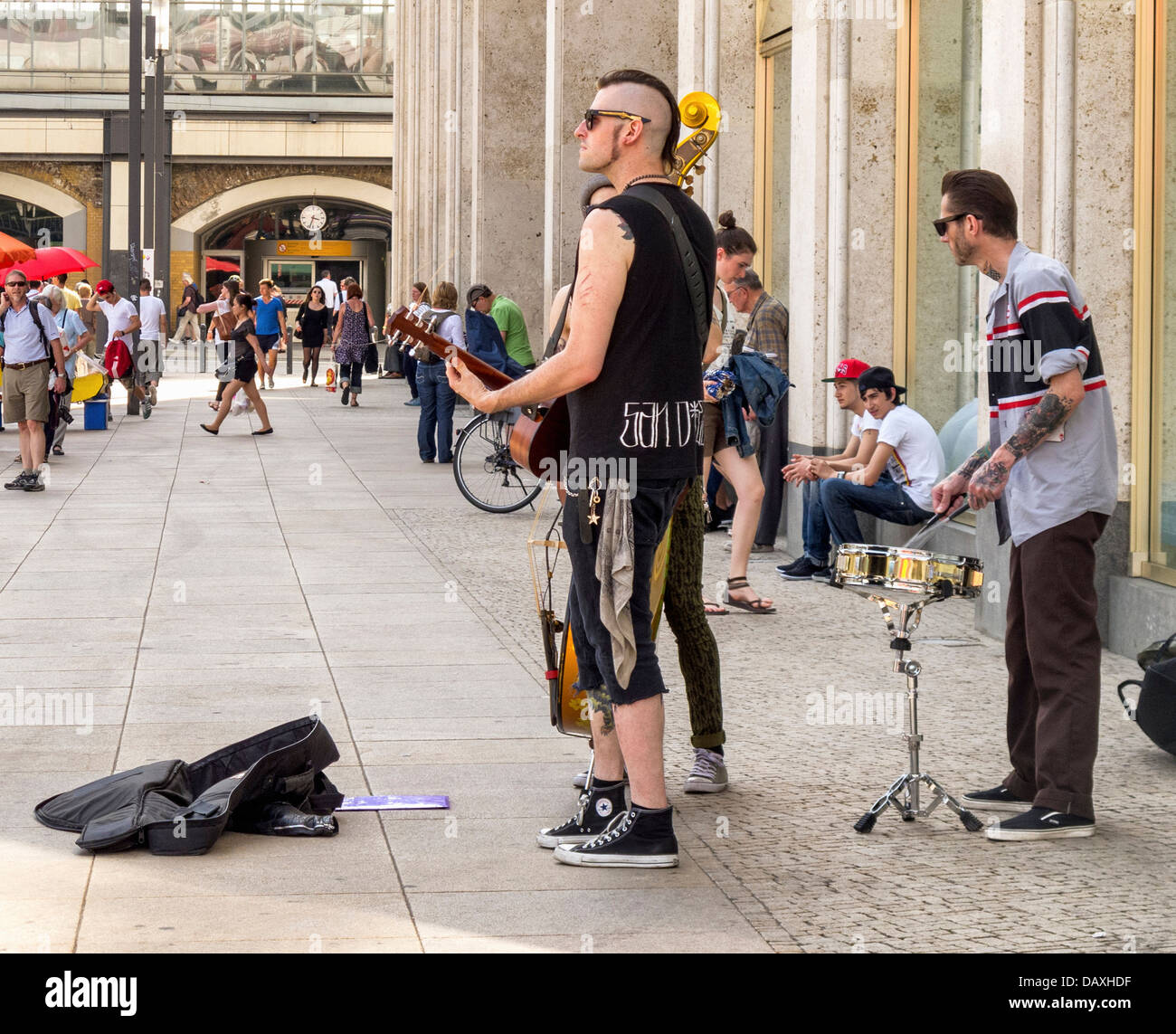 Buskers play music alexanderplatz hi-res stock photography and images ...