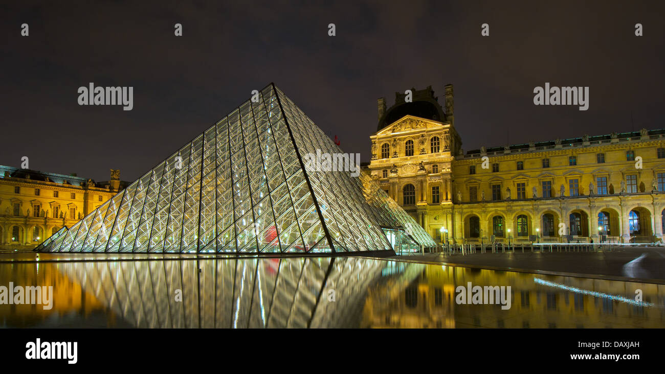 Louvre museum at night, Paris, France Stock Photo - Alamy