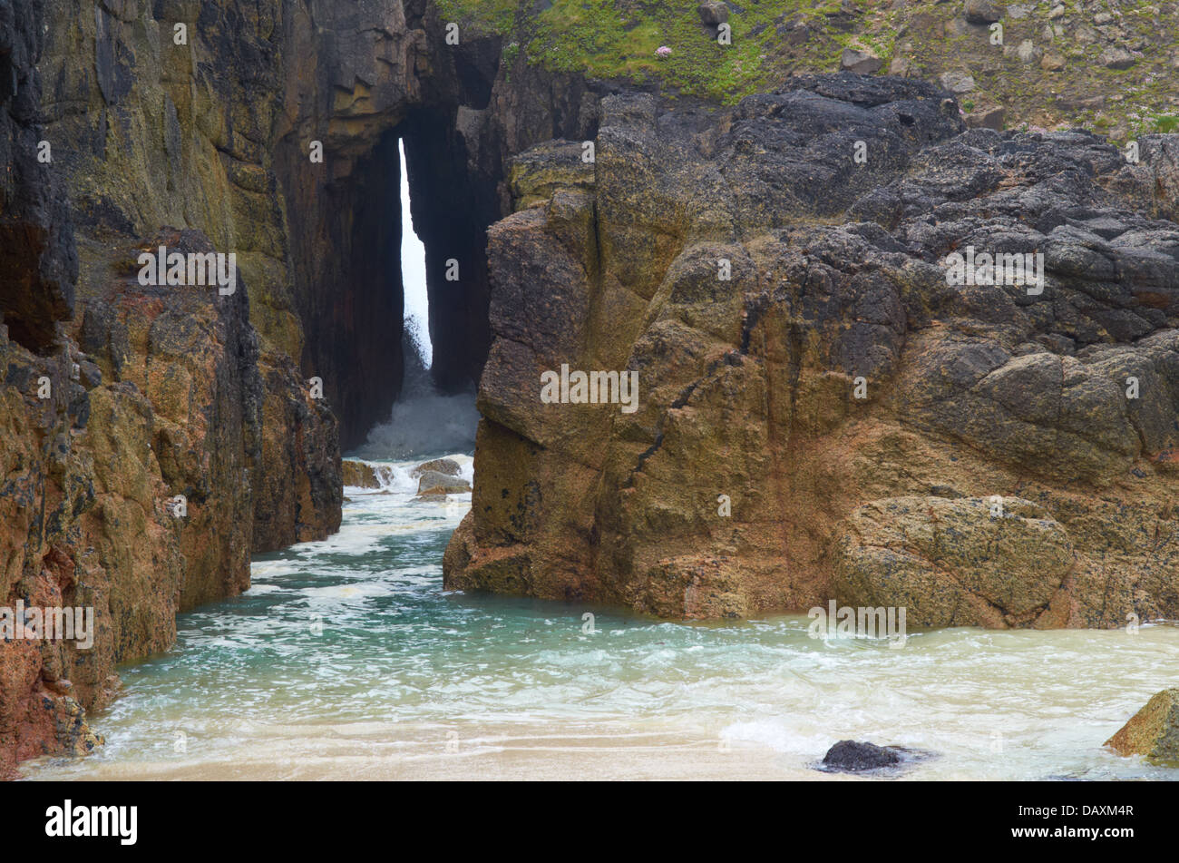 Zawn Pyg natural arch at Nanjizal Beach - Cornwall, England, UK Stock ...