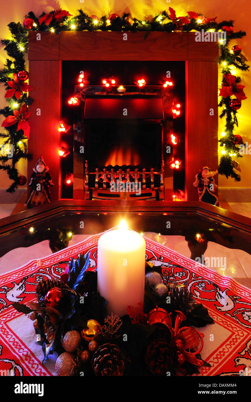 Coal effect electric fire with Christmas decorations, England, UK ...