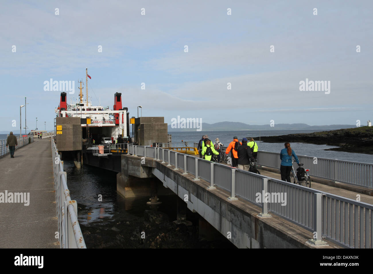 Passengers boarding Calmac ferry Isle of Colonsay Scotland July 2013 ...