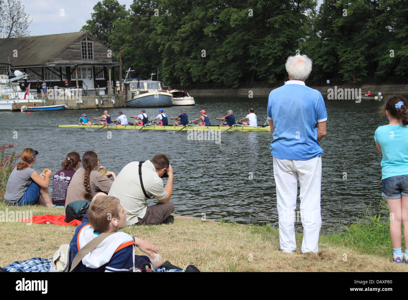 Twickenham Rowing Club men's coxed eight approach the finish line at ...