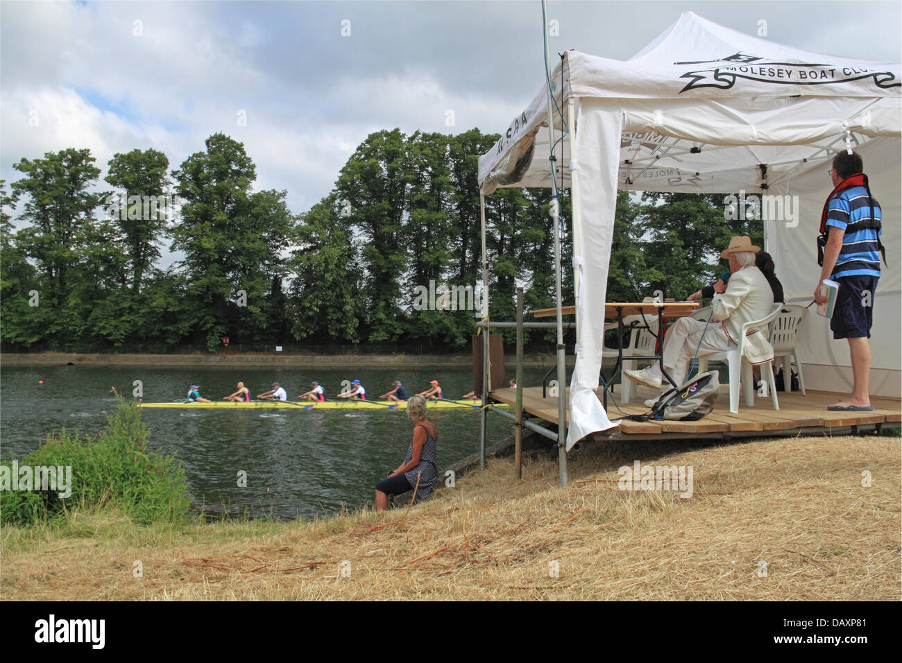 Twickenham Rowing Club men's coxed eight cross the finish line at ...