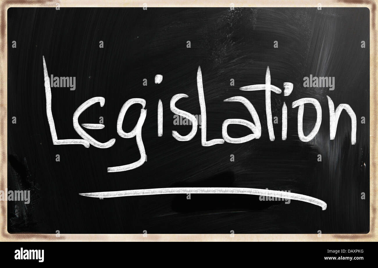 Legislation handwritten with white chalk on a blackboard Stock Photo ...