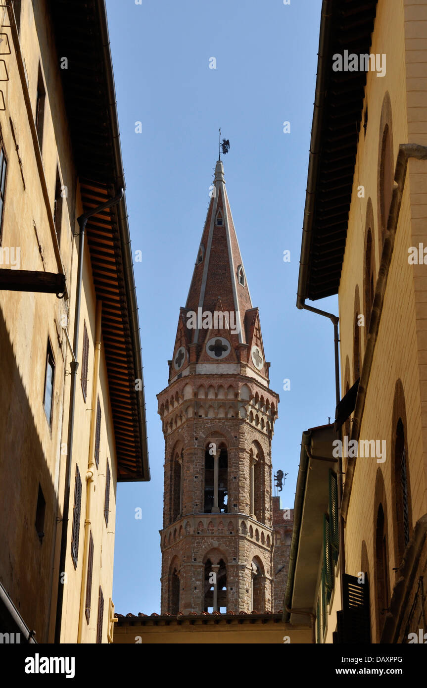 The tower of Badia Fiorentina. The 'abbey' church from a narrow street ...