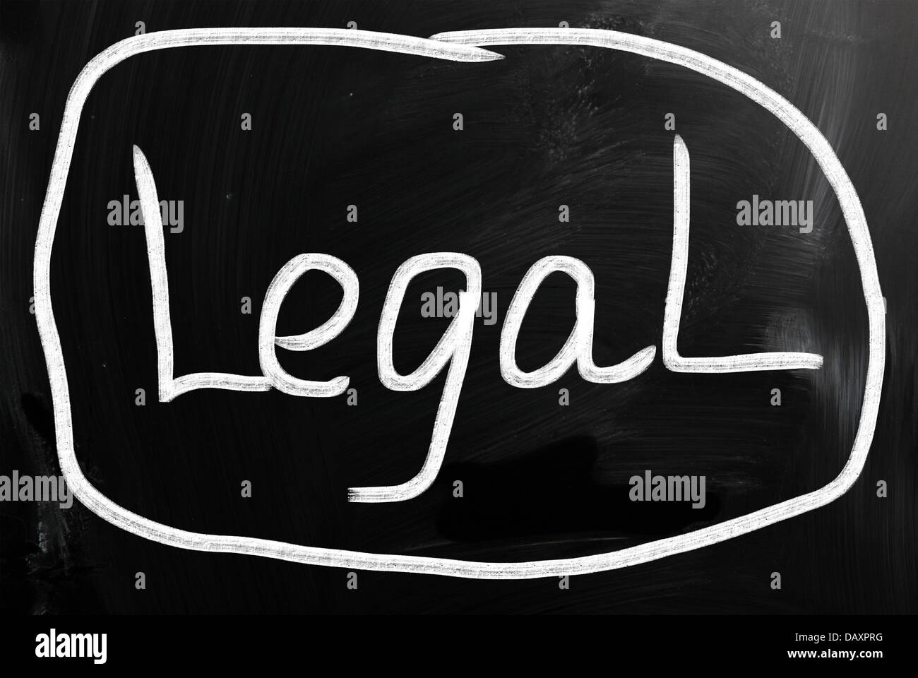 The word "Legal" handwritten with white chalk on a blackboard Stock ...