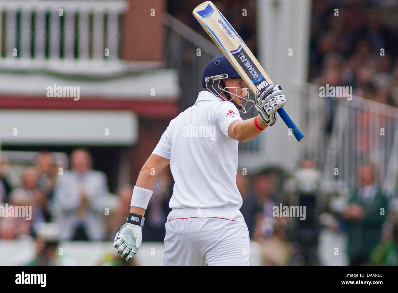 London, UK. 20th July, 2013. Joe Root raises his bat after scoring a ...