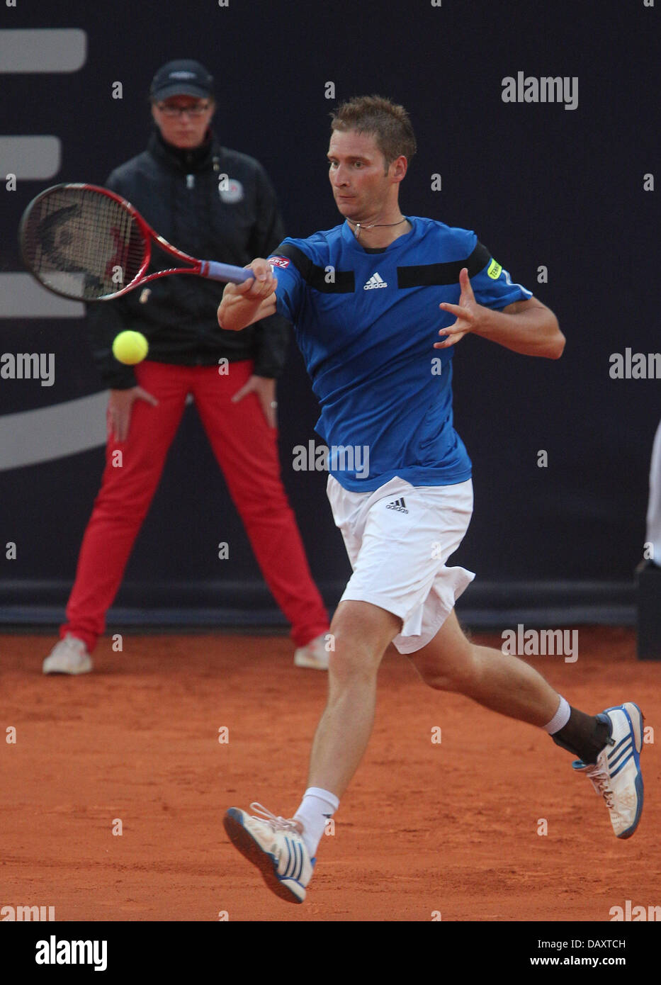 Hamburg, Germany. 20th July, 2013. Germany's Florian Mayer returns the ball during the ...