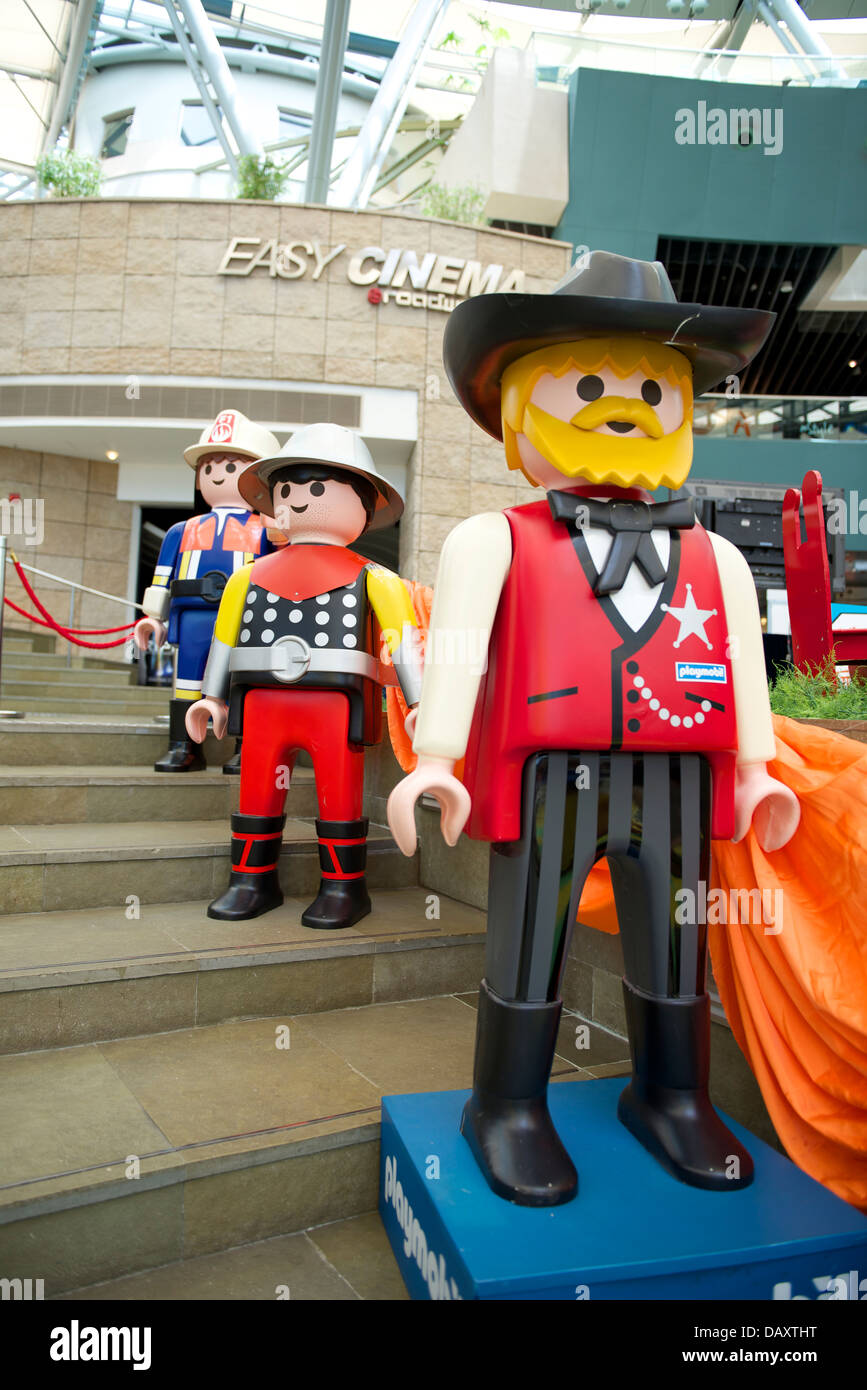 Large life size Play people at Cyberport, Hong Kong Stock Photo - Alamy