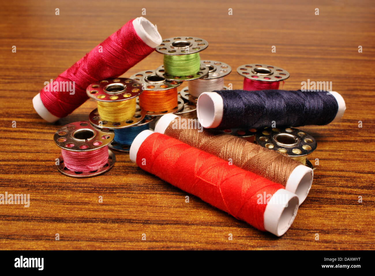 Thread a sewing machine Stock Photo - Alamy