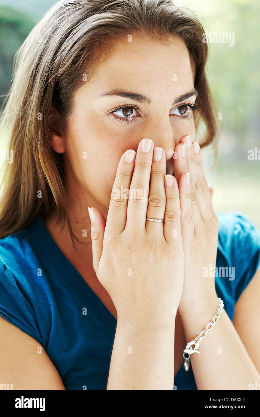 Woman looking shocked Stock Photo - Alamy