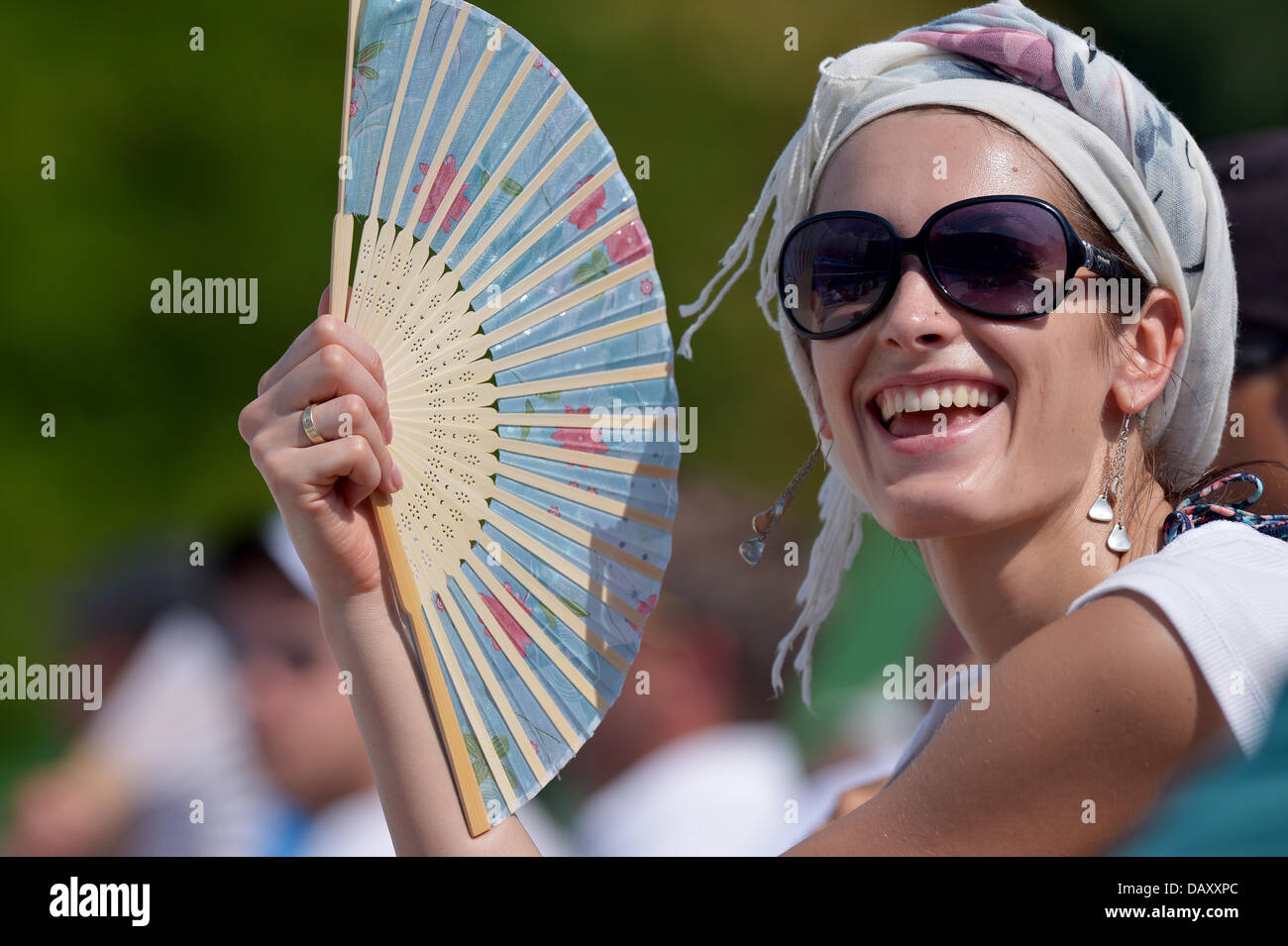 Barcelona, Spain. 20th July, 2013. A fan attends the men's 1m ...