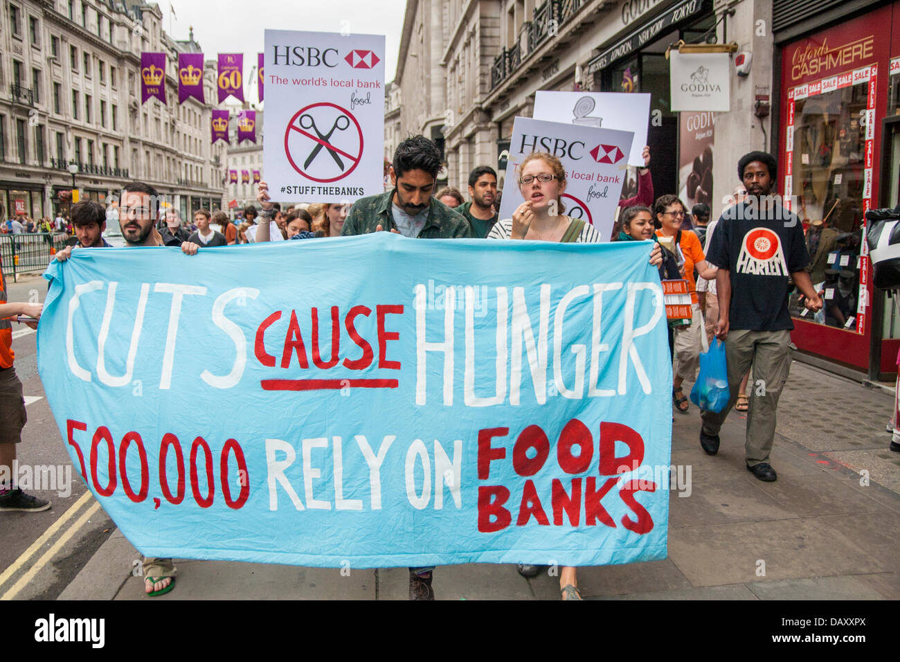 London, UK. 20th July, 2013. Protesters march along Regents Street as ...