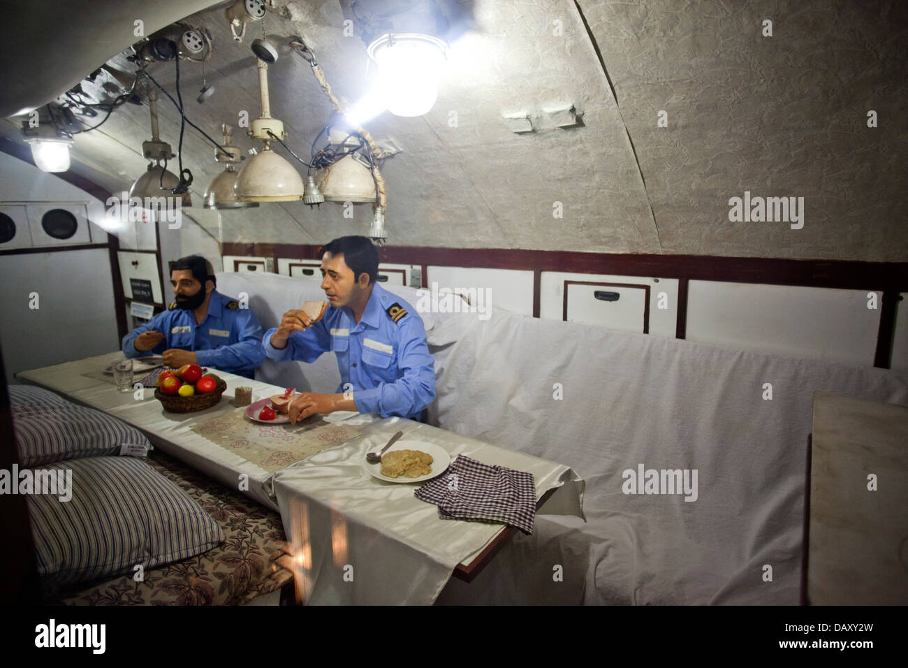 Statues of technicians at dining table in a Stock Photo - Alamy