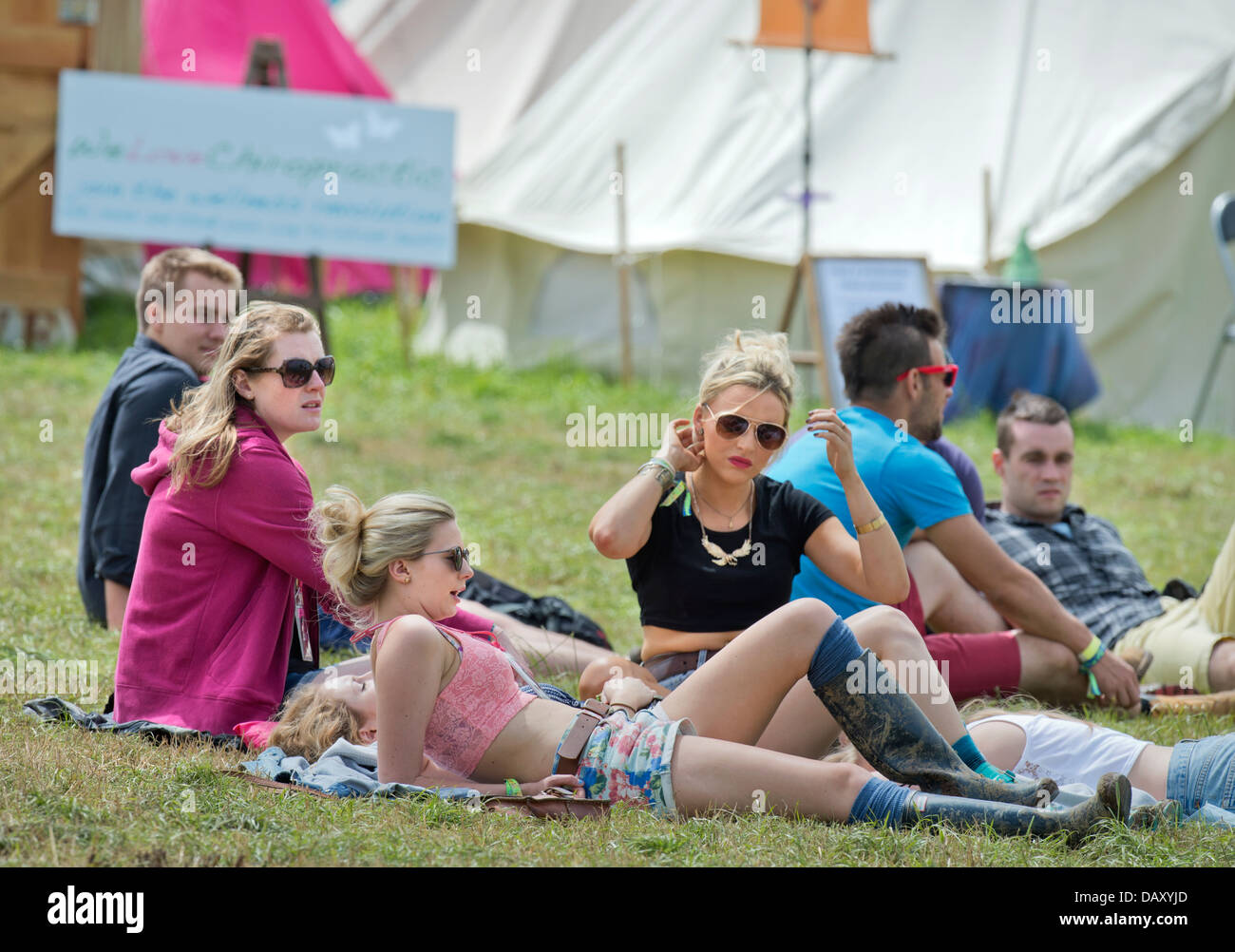 Glastonbury Festival June 2013 - Girls sunbathing in the Healing Field ...