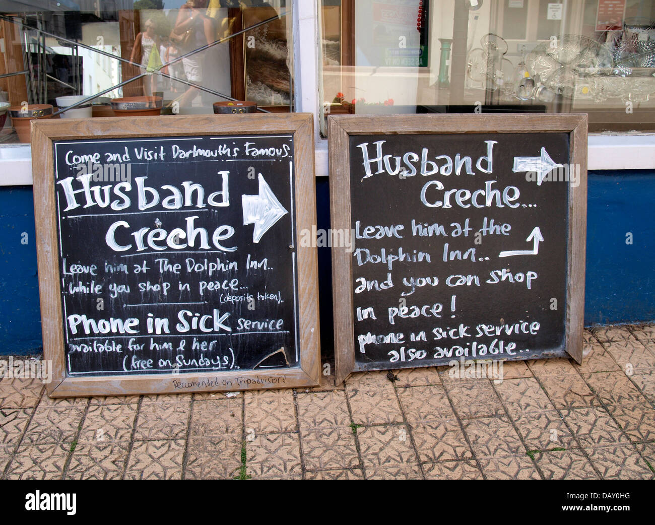 Signs for The Dolphin Pub, Home of the Dartmouth husband crèche, Devon ...