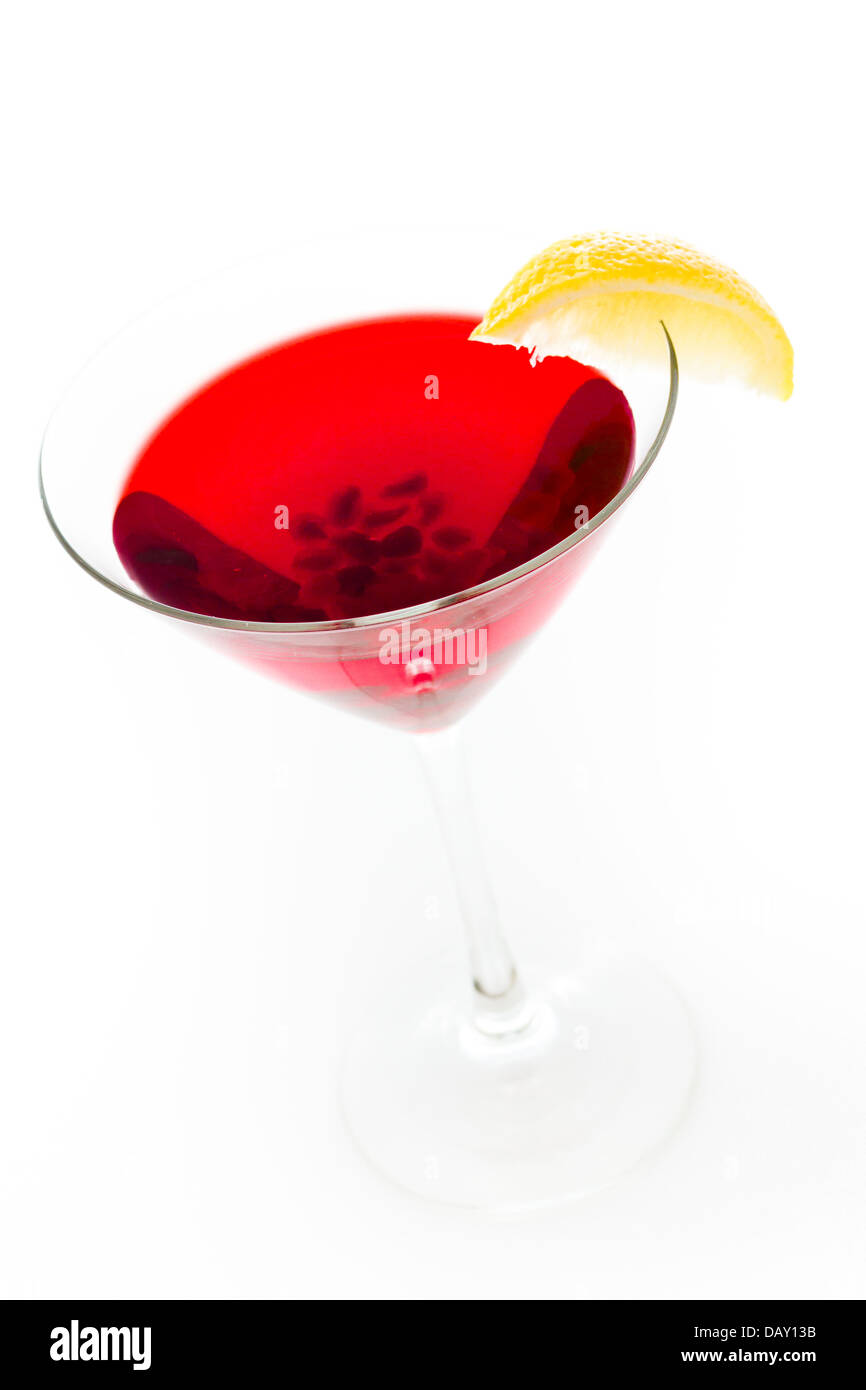 Pomegranate cosmo cocktail with lemon as a garnish Stock Photo - Alamy