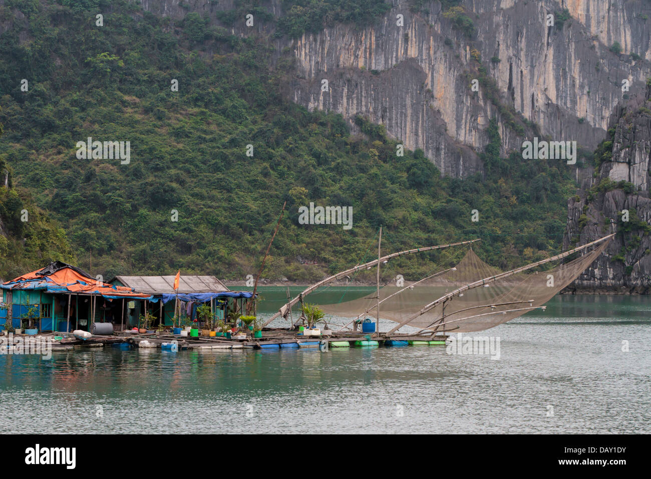 A small fishing camp among the karsts and islands of Ha Long Bay ...