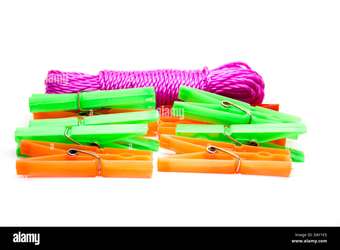 Plastic clips with clothesline Stock Photo - Alamy