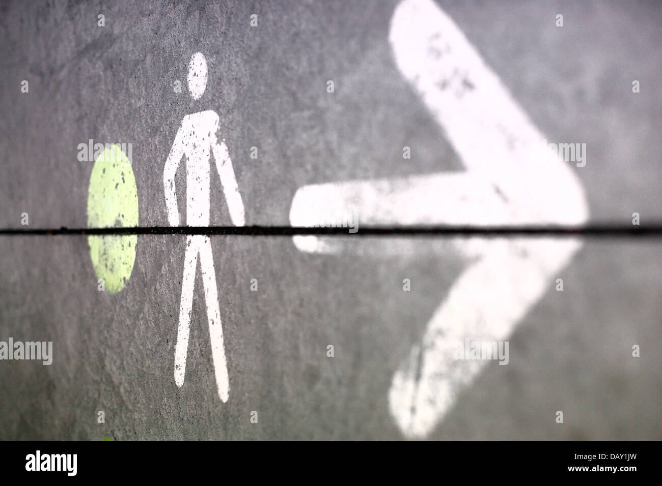 Human figure and arrow indicating exit Stock Photo - Alamy