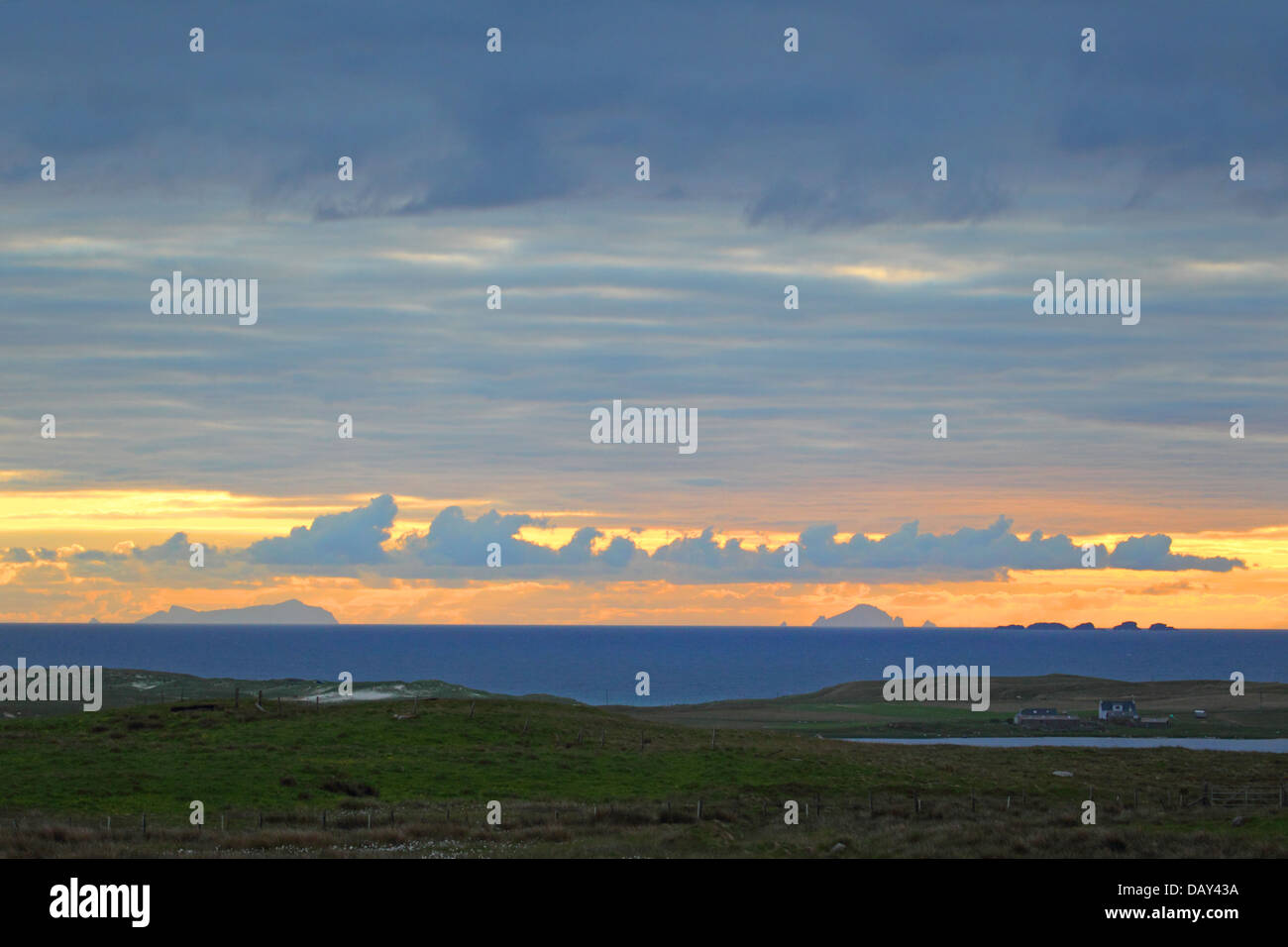 A view of the St Kilda island archipelago from North Uist at sunset ...