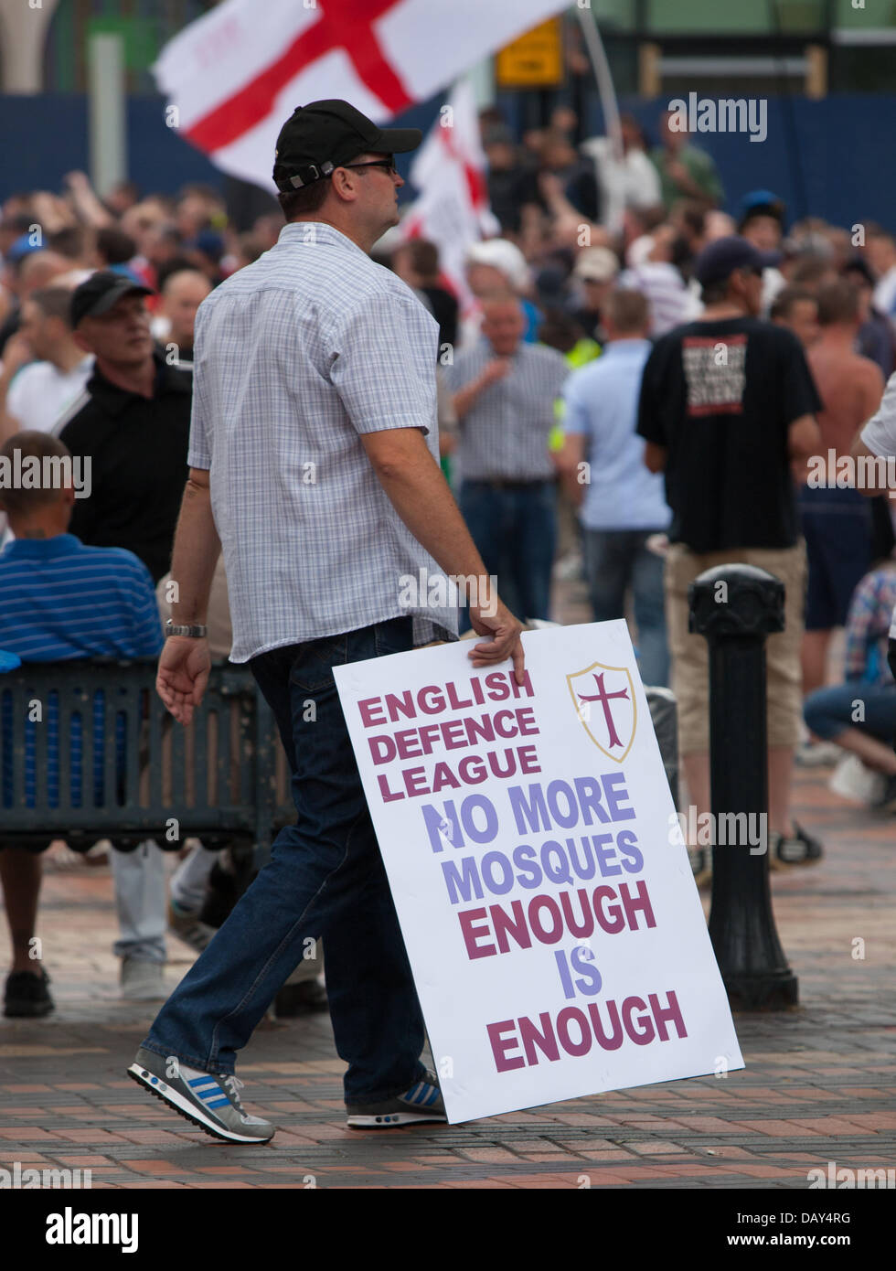 Birmingham, UK. 20th July 2013. EDL member with a banner declaring "No ...