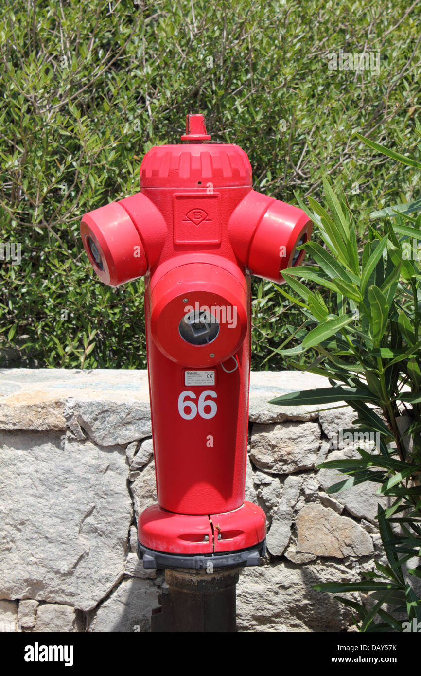 Red fire hydrant in northern Corsica, France Stock Photo - Alamy