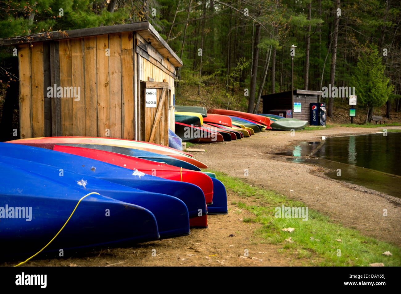 Canoes along the shore of Mazinaw Lake at Bon Echo Provincial Park ...