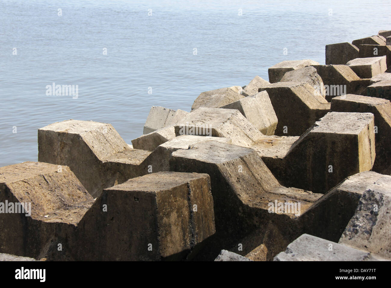 Large cement blocks used in the jetty breakwater of the Cinta Costera ...