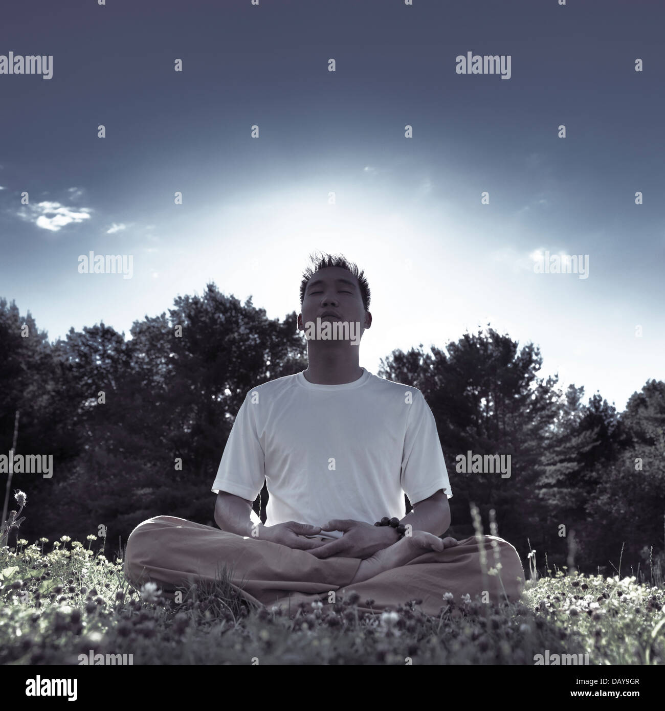 Young buddhist monk meditating in hi-res stock photography and images ...