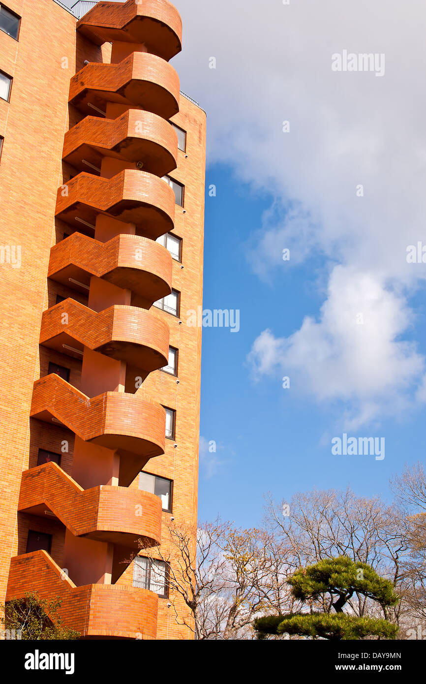 Orange building for a residence and business Stock Photo - Alamy