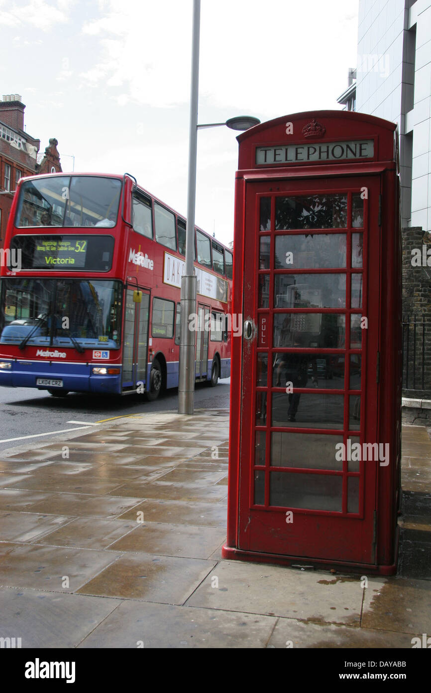 Red telephone booth with double decker bus, London, England Stock Photo ...