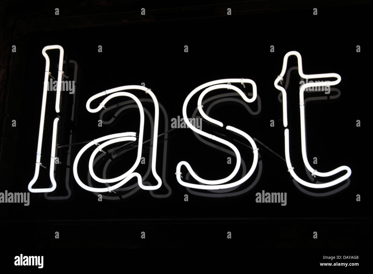 Neon sign spelling LAST Stock Photo - Alamy