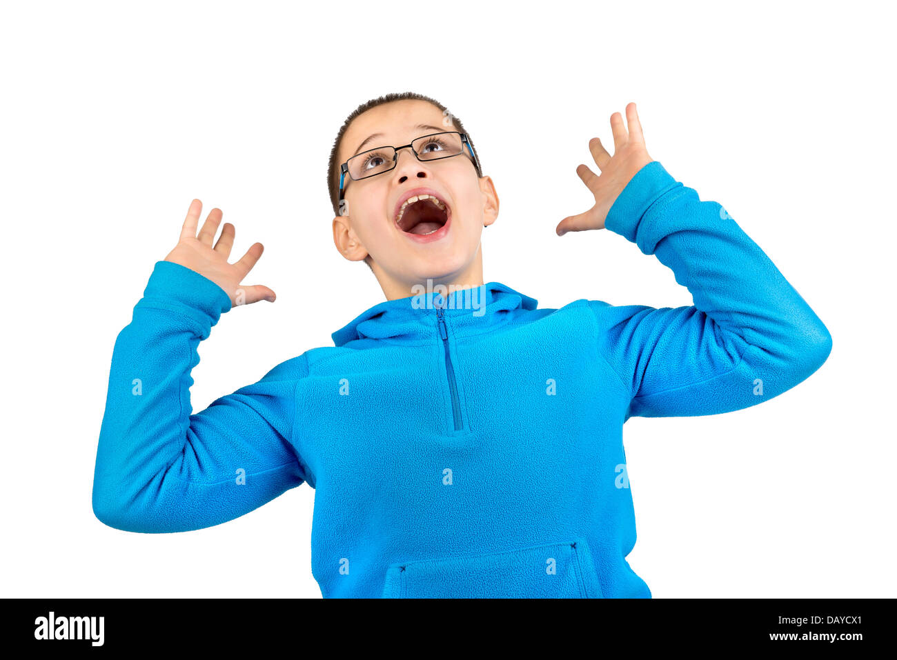 Young boy screaming isolated in white Stock Photo - Alamy